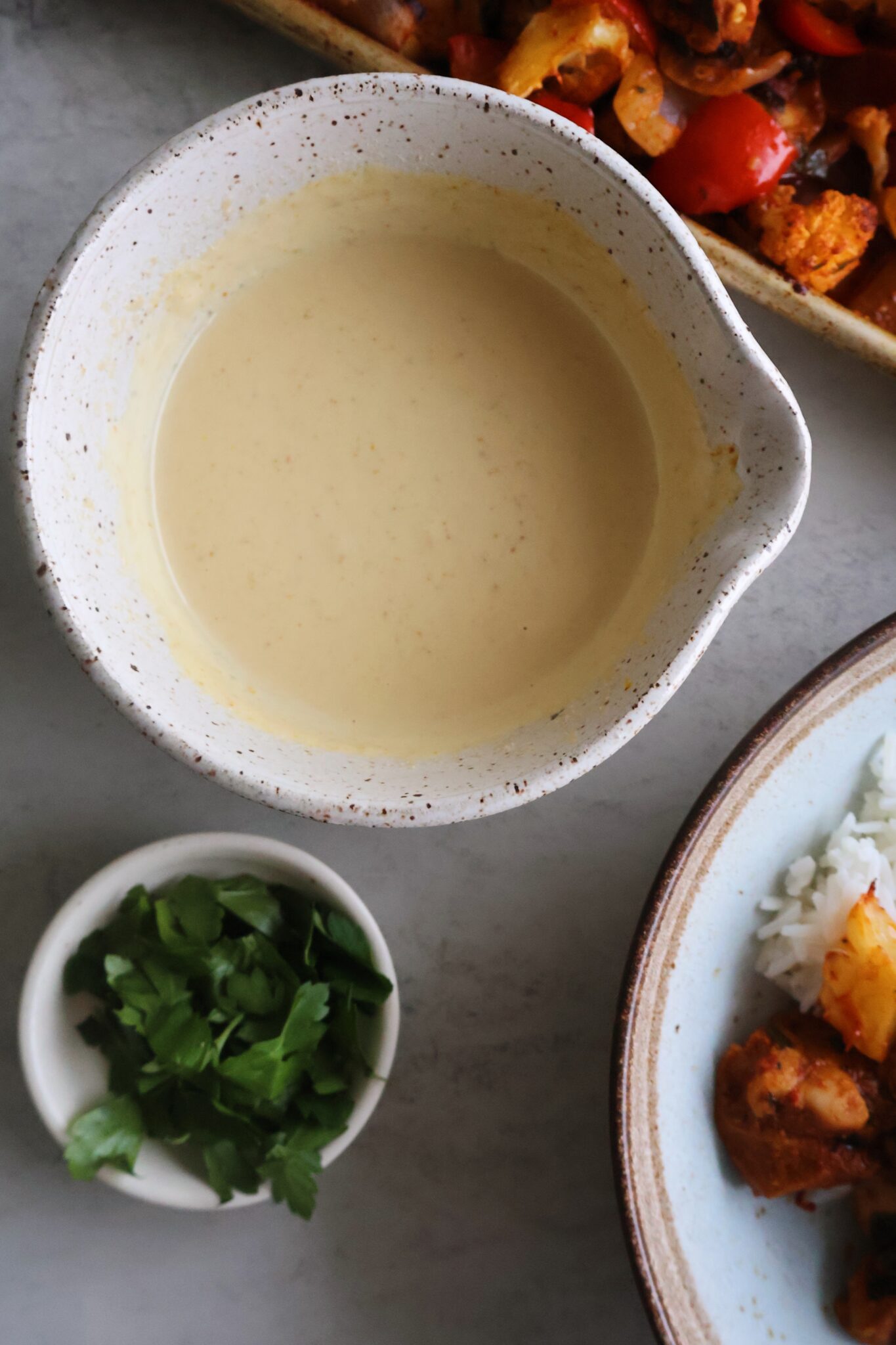 Sheet Pan Harissa Chicken with Amba Tahini - Something Nutritious